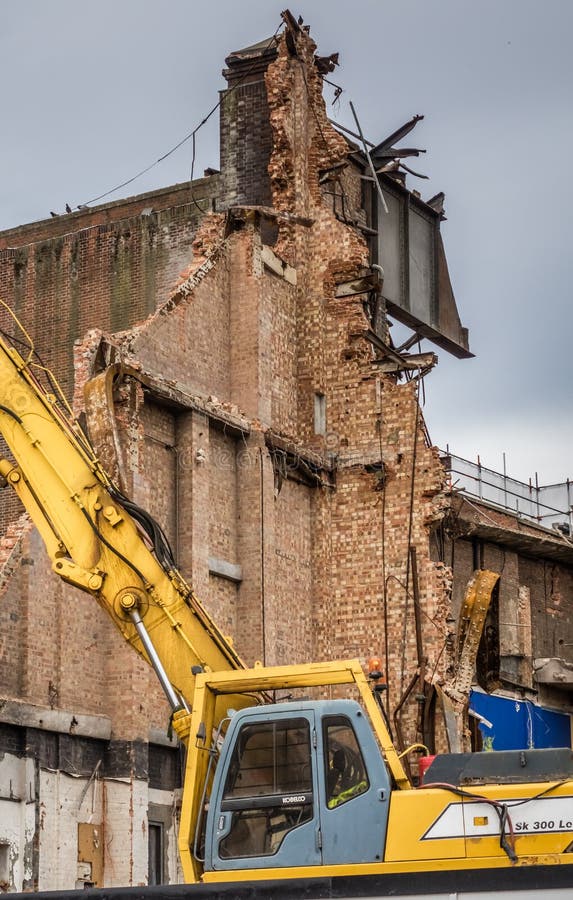 Demolition in Progress of Derelict House on Construction Building Site ...