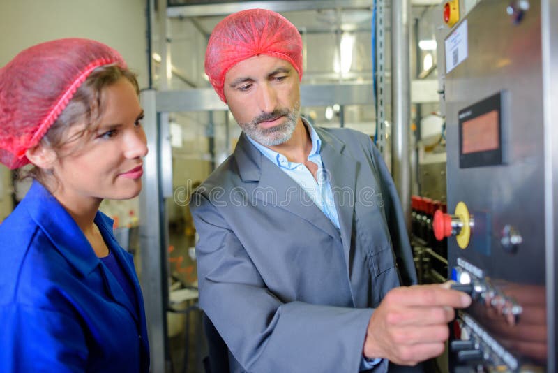 Demonstrating a Machine Adjustment Stock Image - Image of industry ...