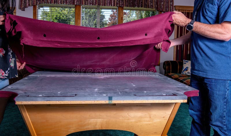 Demonstrating the Removal of Felt from a Pool Table Stock Photo - Image ...