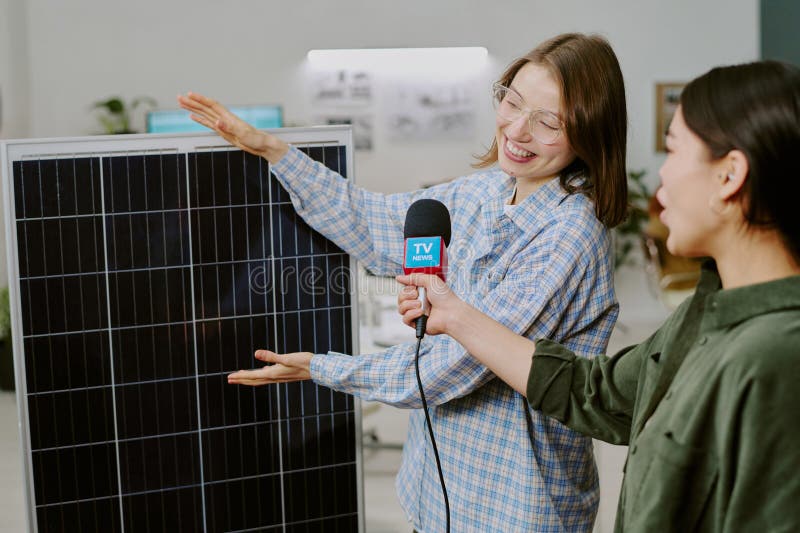 Demonstrating Solar Panel Technology for Interview Stock Photo - Image ...