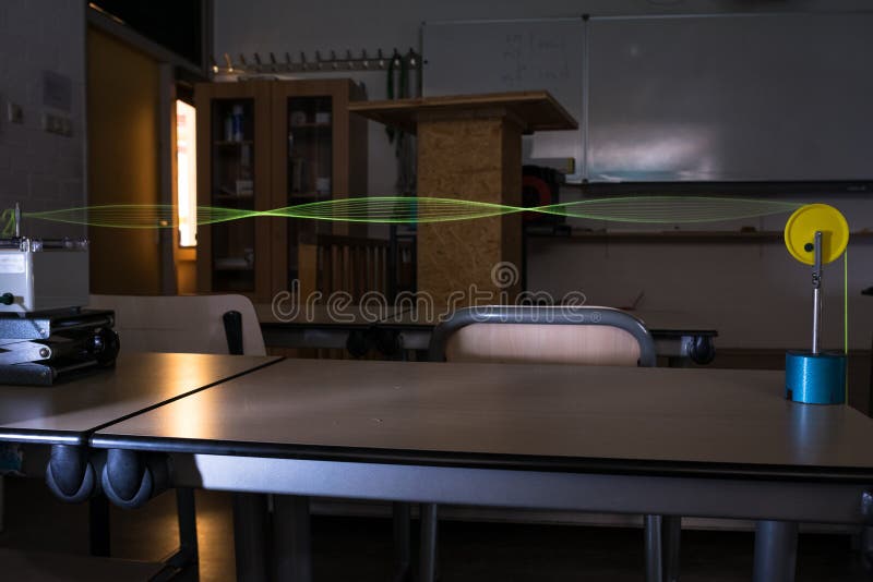 Demonstration of Standing Waves on a String, Illuminated by Stroboscope ...