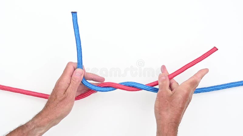 Demonstration of Tying a Reef or Square Knot To Join Two Pieces of Rope ...