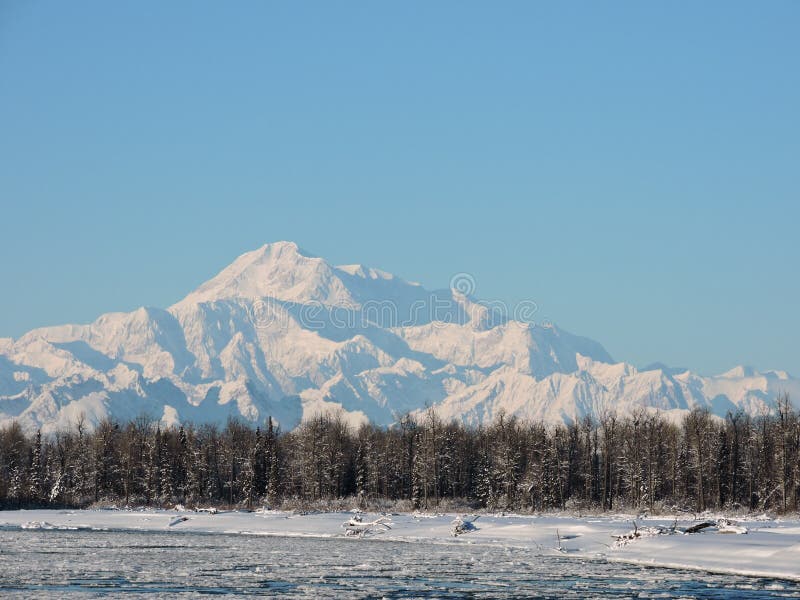 Denali on a cloudless day stock photo. Image of snow - 107608402