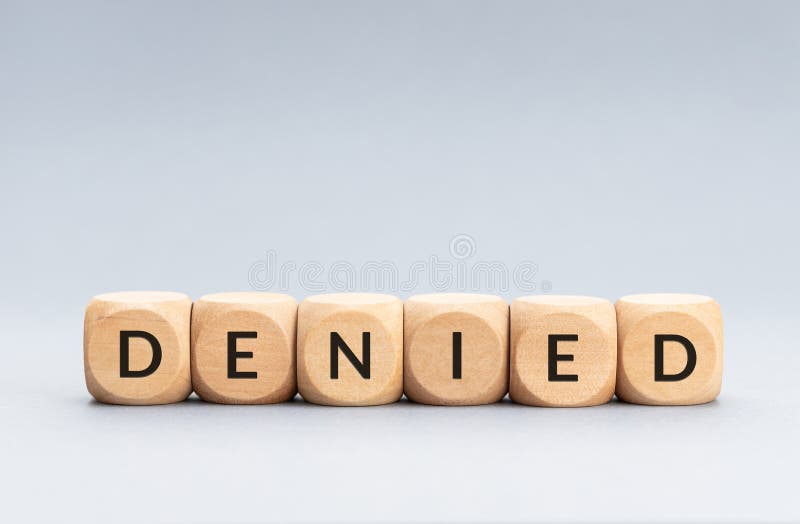 Denied Word on Wooden Blocks on Gray Background Stock Photo - Image of ...