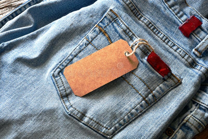 Denim Blue Jeans with Brown Price Tag Stock Photo - Image of casual ...