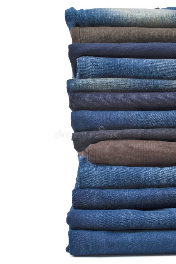 Jeans stack on white stock photo. Image of jeans, folded - 136502560