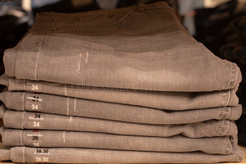 A Denim Pants, a Stack of Brown Jeans Stock Image - Image of garment ...
