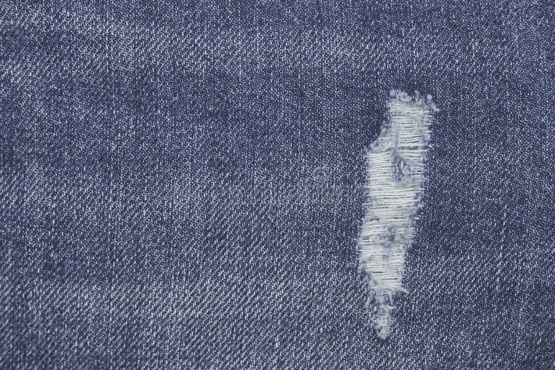 Denim Ripped Blue Jeans Texture. Abstract Background Faded Jeans ...