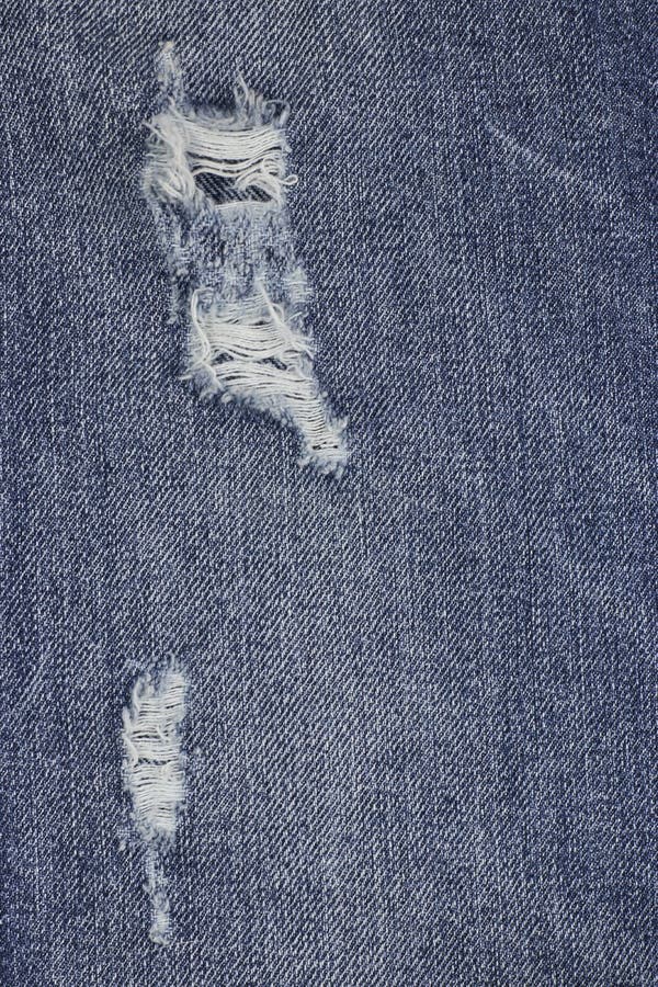 Denim Ripped Blue Jeans Texture. Abstract Background Faded Jeans ...