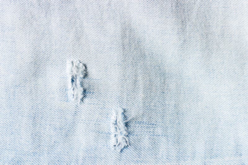 Denim Texture. Texture of Ripped Light Blue Jeans Stock Image - Image ...