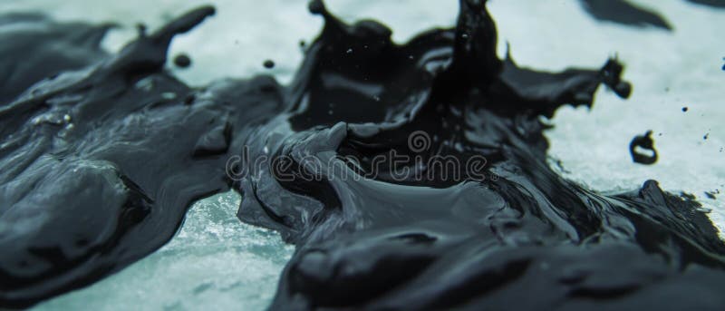Dense Black India Ink Creating Rich Textures on a Surface Stock ...