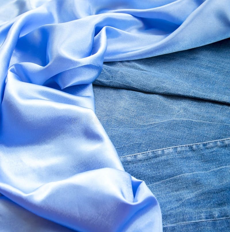 Dense Blue Denim Fabric, Smooth Sky-blue Silk and a Delicate Lac Stock ...