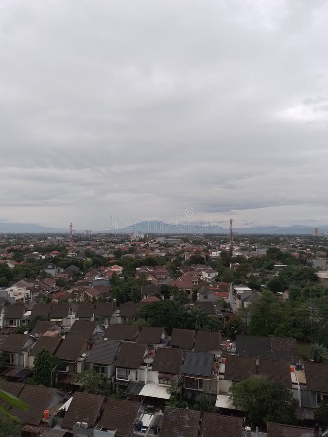 2. Dense City View with Beautiful Mountain Backdrop Stock Photo - Image ...