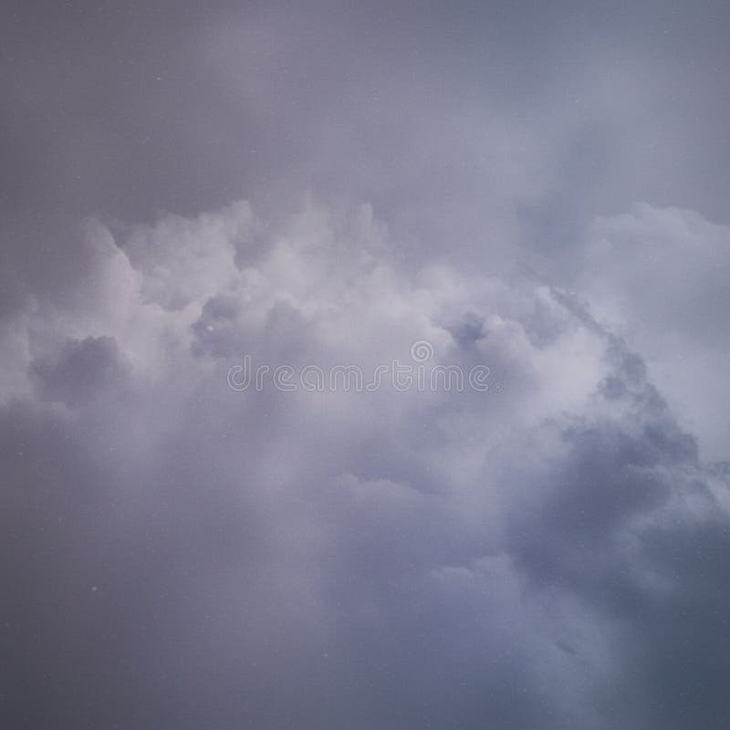A Dense Cloud Formation with Varying Shades of Gray and White ...