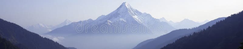 Dense Fog Envelops a Snow Capped Peak in the Himalayas, , Forest Stock ...