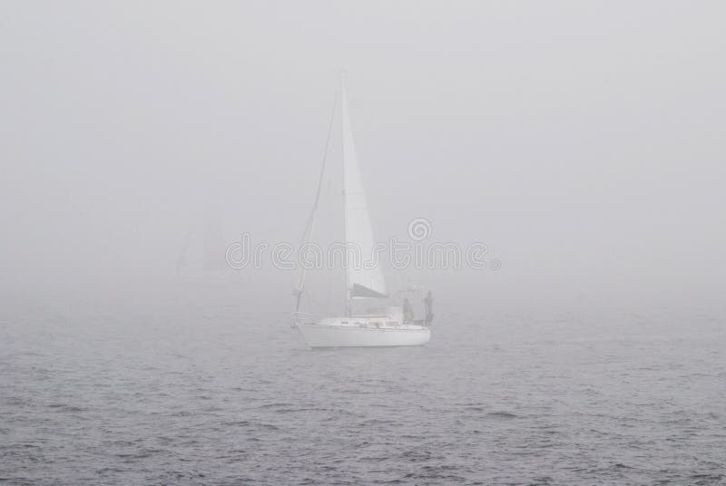 Sailing in fog stock photo. Image of water, captain, ocean - 5557110