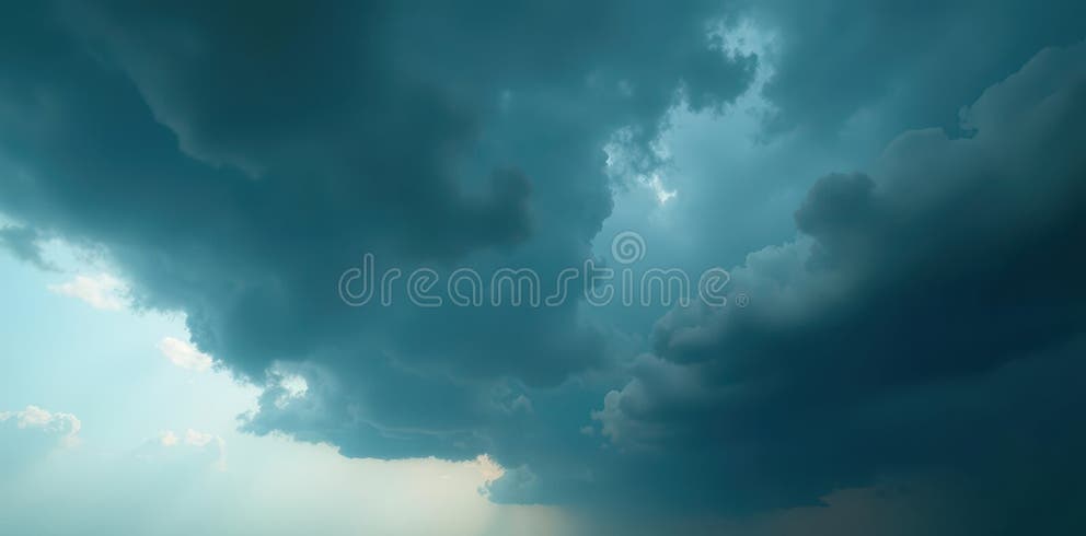Dense, Grey Storm Clouds Loom Overhead, a Dramatic Low Angle , Powerful ...