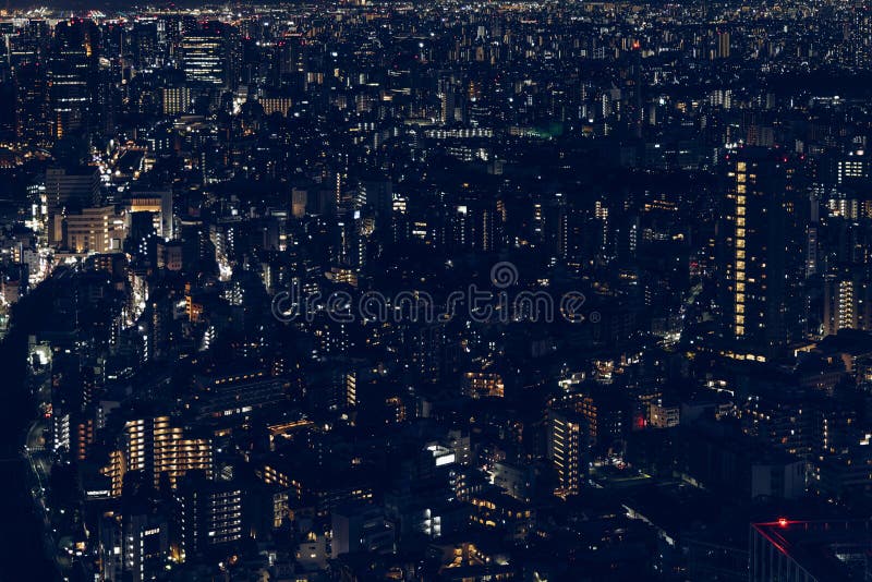Dense Urban Landscape of Tokyo at Night with Illuminated Buildings ...