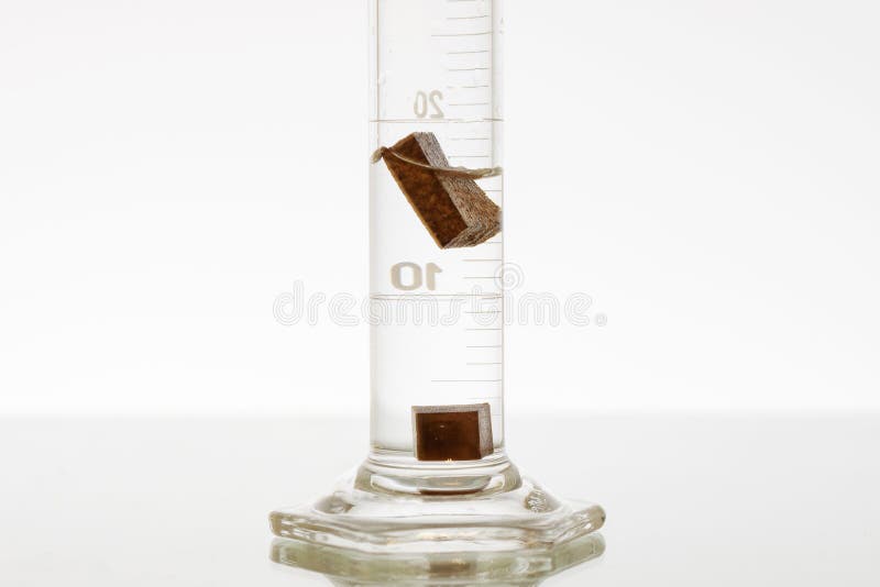 Graduated Cylinder Density Experiment Stock Photos - Free & Royalty ...