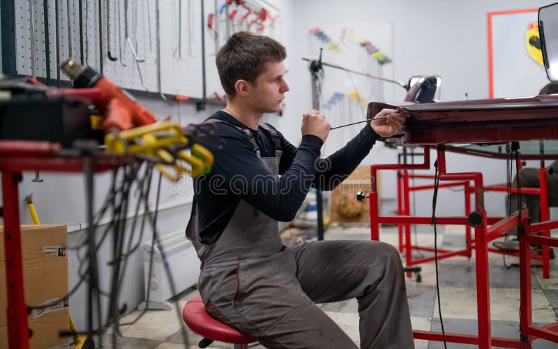Dent Removing Work Process of Young Professional Car Repair Employer ...