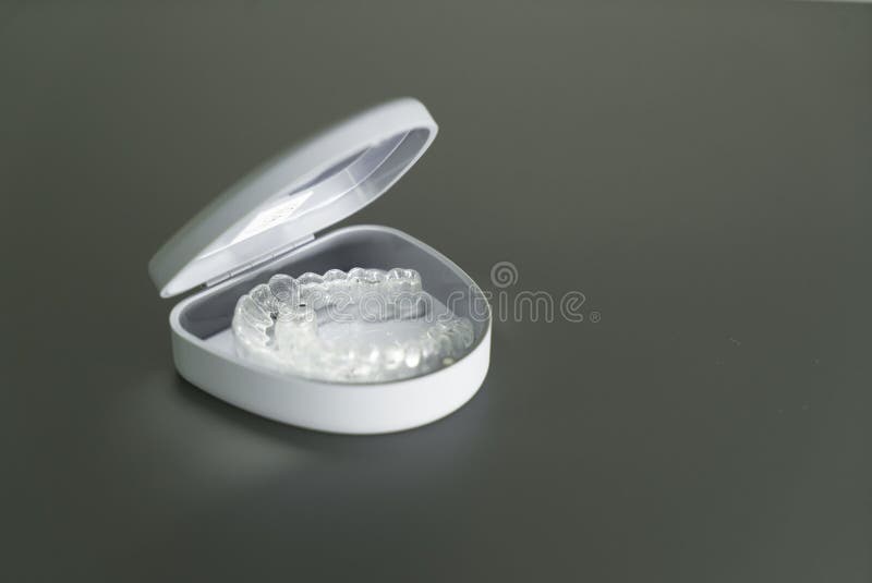Dental Aligner in Box. Invisible Orthodontic Cosmetic Brackets Stock ...