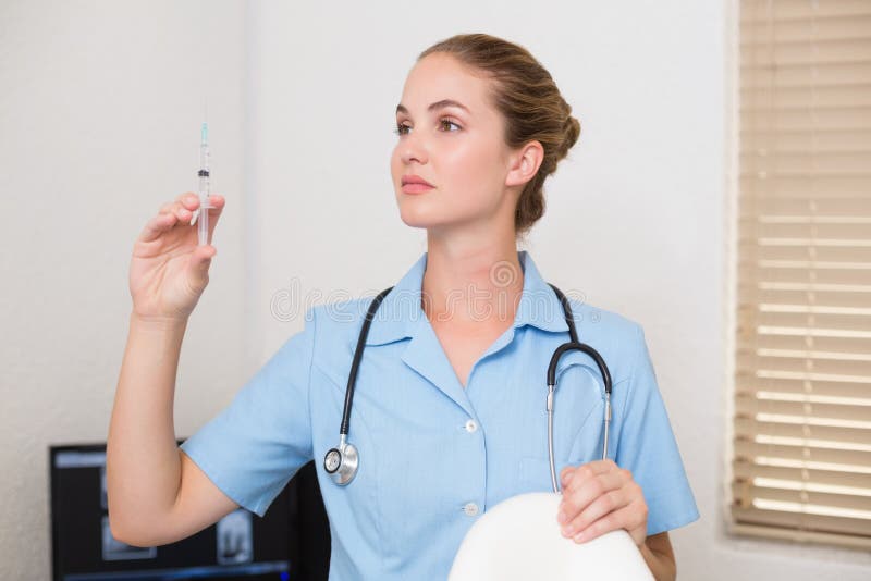 Dental Assistant Preparing an Injection Stock Image - Image of dentist ...