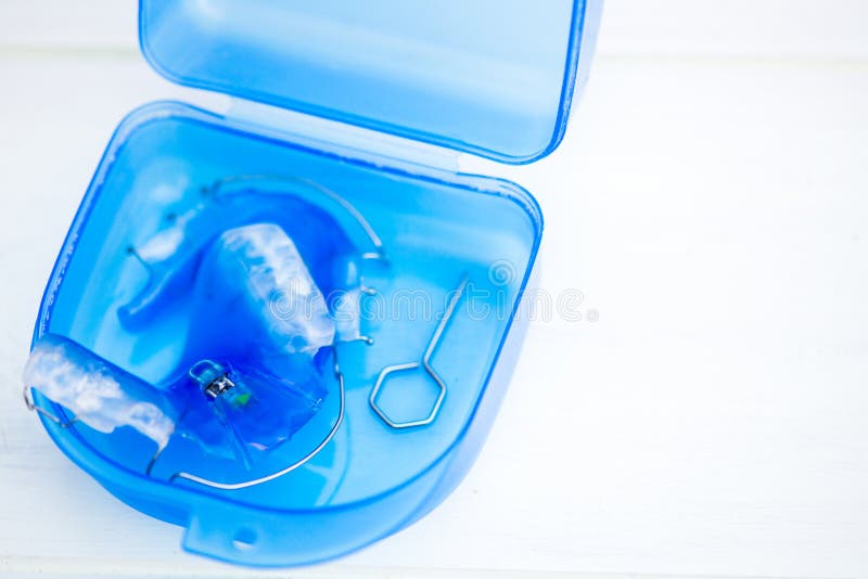 Orthodontic White Teeth Model Used in Dentistry Holding Red Lollipop ...