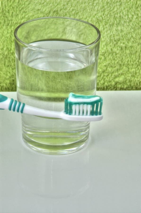 Dental Brush and Glass of Water Stock Image - Image of water ...