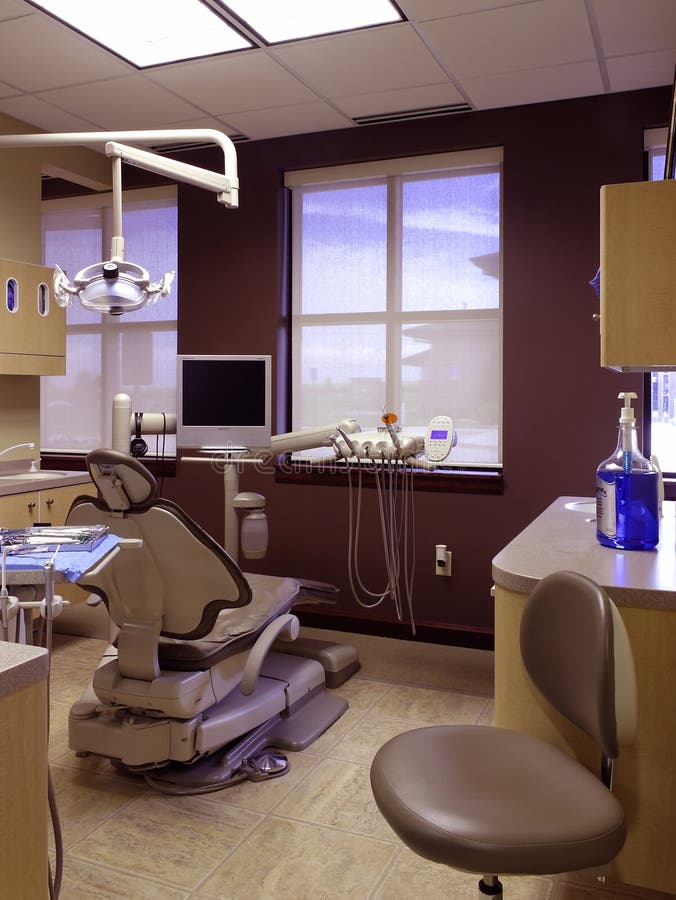 Dental Exam Room - Empty Patient Chair and Light Stock Photo - Image of ...