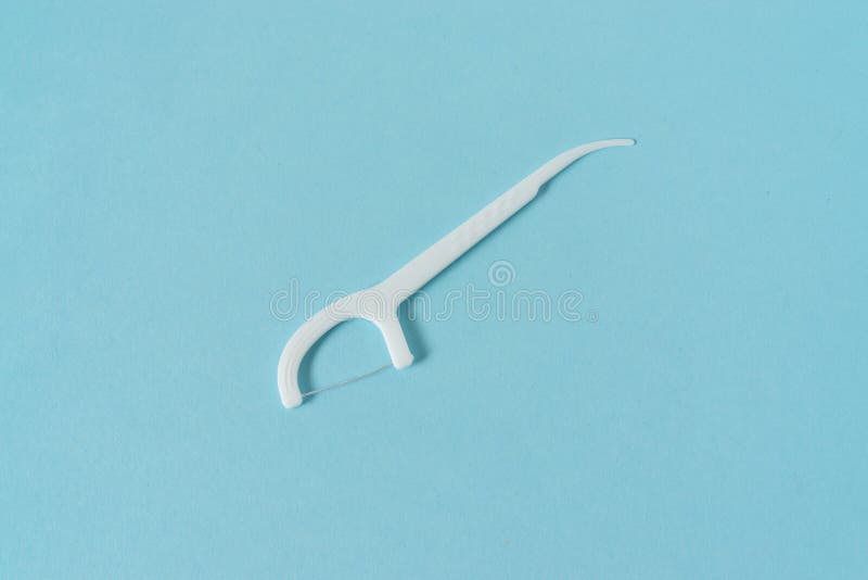 A Dental Floss Picks on Blue Background Stock Image - Image of beauty ...