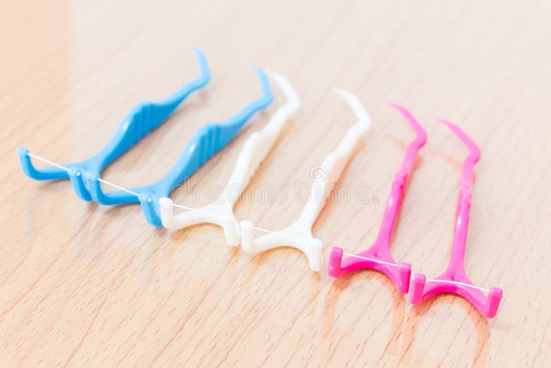 Dental Floss on Wooden Background Stock Photo - Image of flossing, care ...