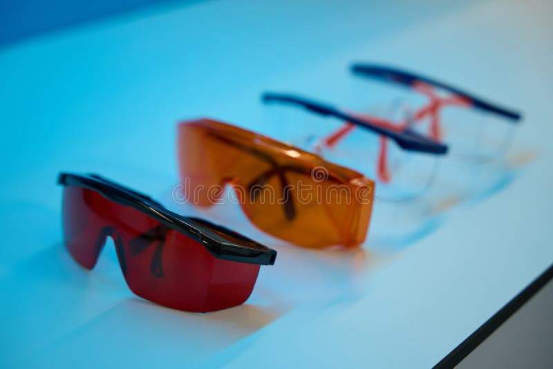 Dental Goggles with Brown and Clear Glass Lie on Table Stock Photo ...