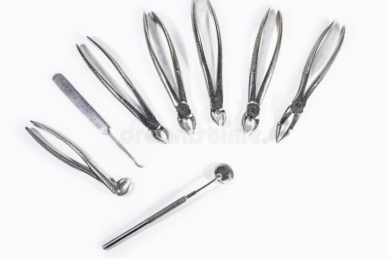 Dental Instruments Arranged on White Table. Stock Photo - Image of ...