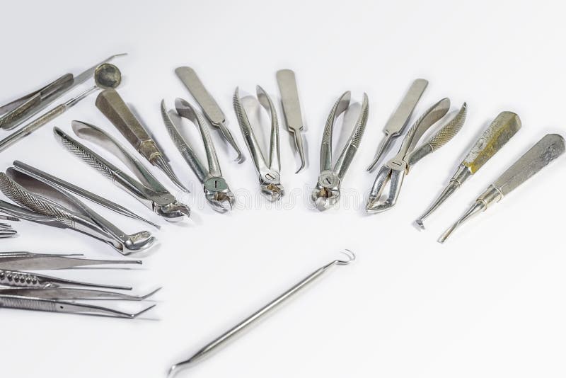Dental Instruments Arranged on White Table. Stock Photo - Image of ...