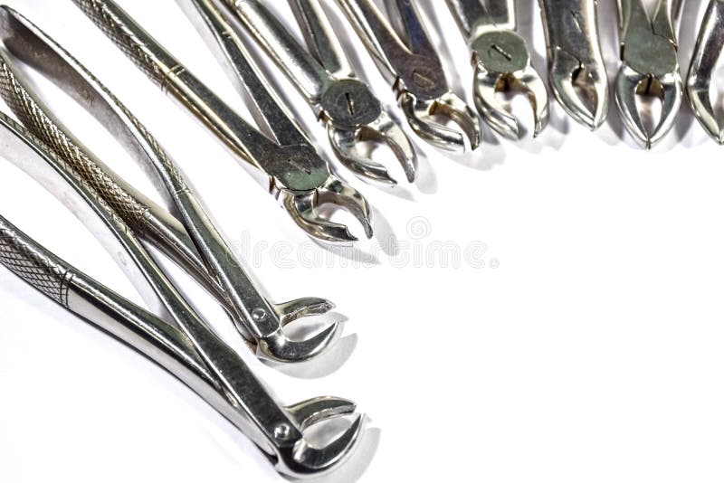 Dental Instruments Arranged on White Table. Stock Photo - Image of ...