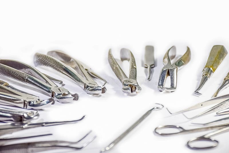 Dental Instruments Arranged on White Table. Stock Photo - Image of ...