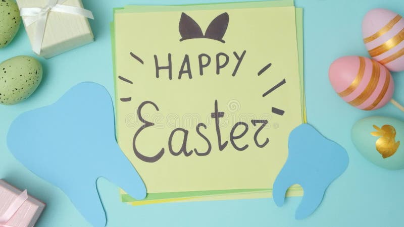 Dental Layout with Teeth Figurines and Postcard with Happy Easter Text ...