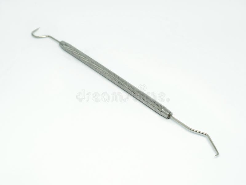 Dental Sharp Hook Instrument on White Stock Image - Image of mirror ...