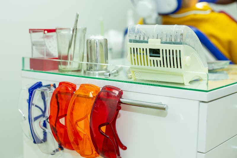 Dental table with tools stock photo. Image of goggles - 236091150