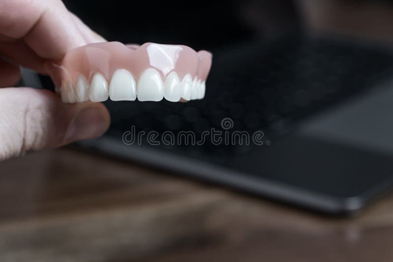 Set of False Teeth with Cleaning Tools Stock Photo - Image of wood ...