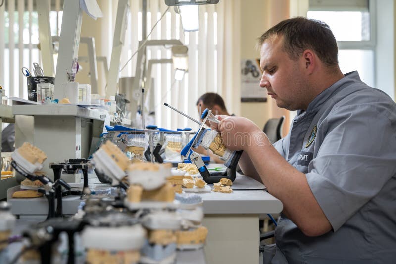 Dental Technician Makes Denture in Office Stock Photo - Image of ...