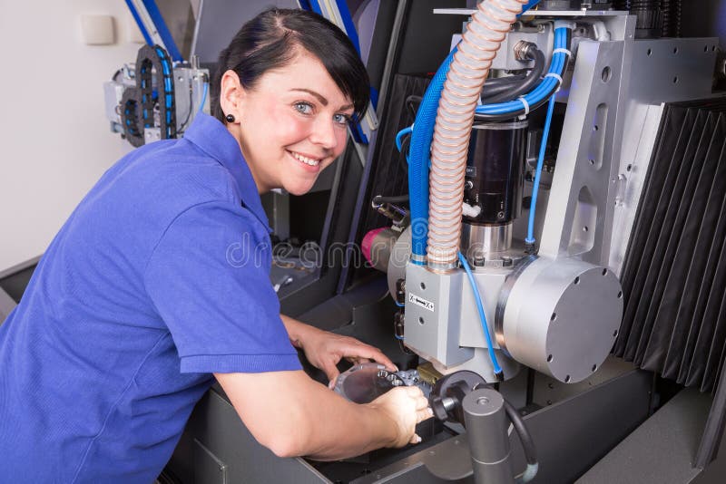 Technician in a Dental Lab Working at a Drilling or Milling Machine ...