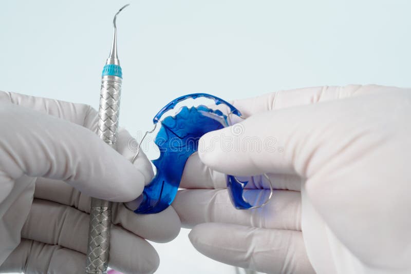 Dental tools and retainer. stock photo. Image of cure - 114859178