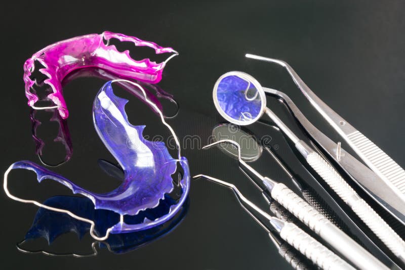 Dental tools and retainer. stock photo. Image of equipment - 116597614