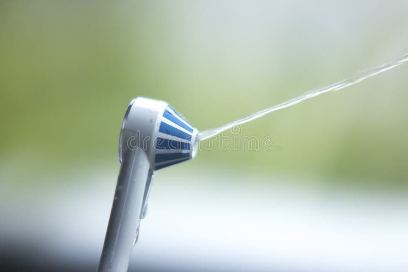 Dental water spray cleaner stock photo. Image of teeth - 98147848