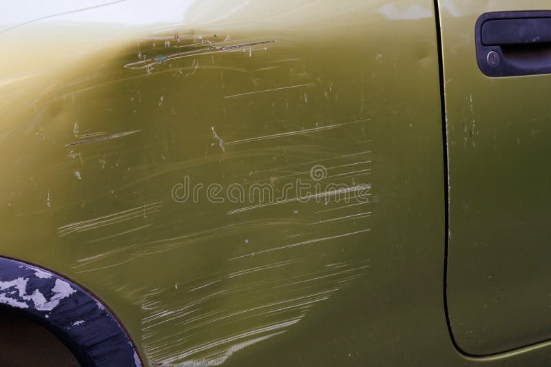 Dented Car Side with Scratches from Accident without Paint Stock Image ...
