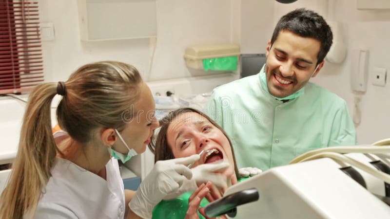 Dentist, Assistant and Scared Patient at Surgery Stock Video - Video of ...
