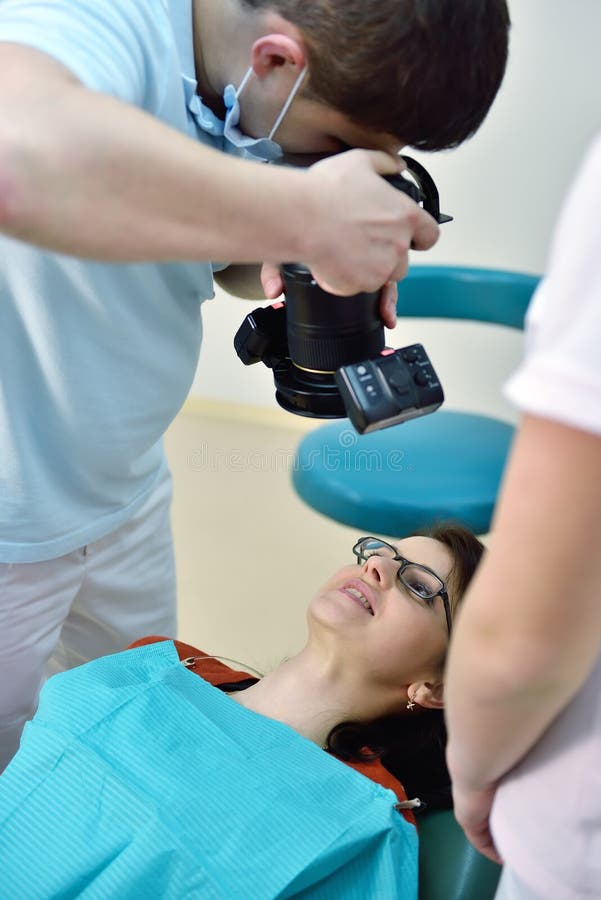 Dentist with Camera Shooting of Patients Stock Photo - Image of health ...