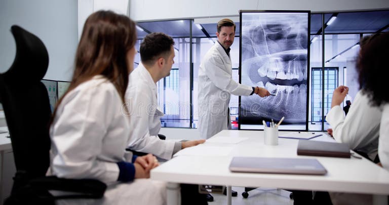 Dentist Doctor Looking at Teeth Xray Stock Photo - Image of computer ...
