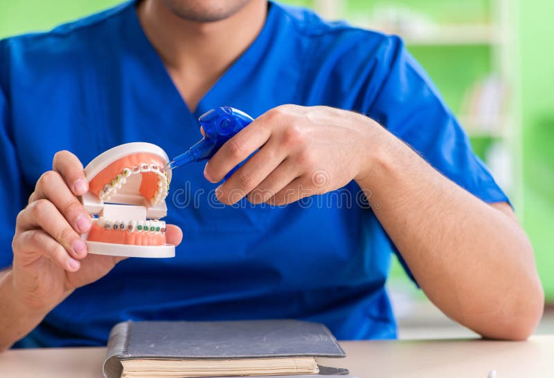 Dentist Doctor Working on New Tooth Implant Stock Image - Image of ...